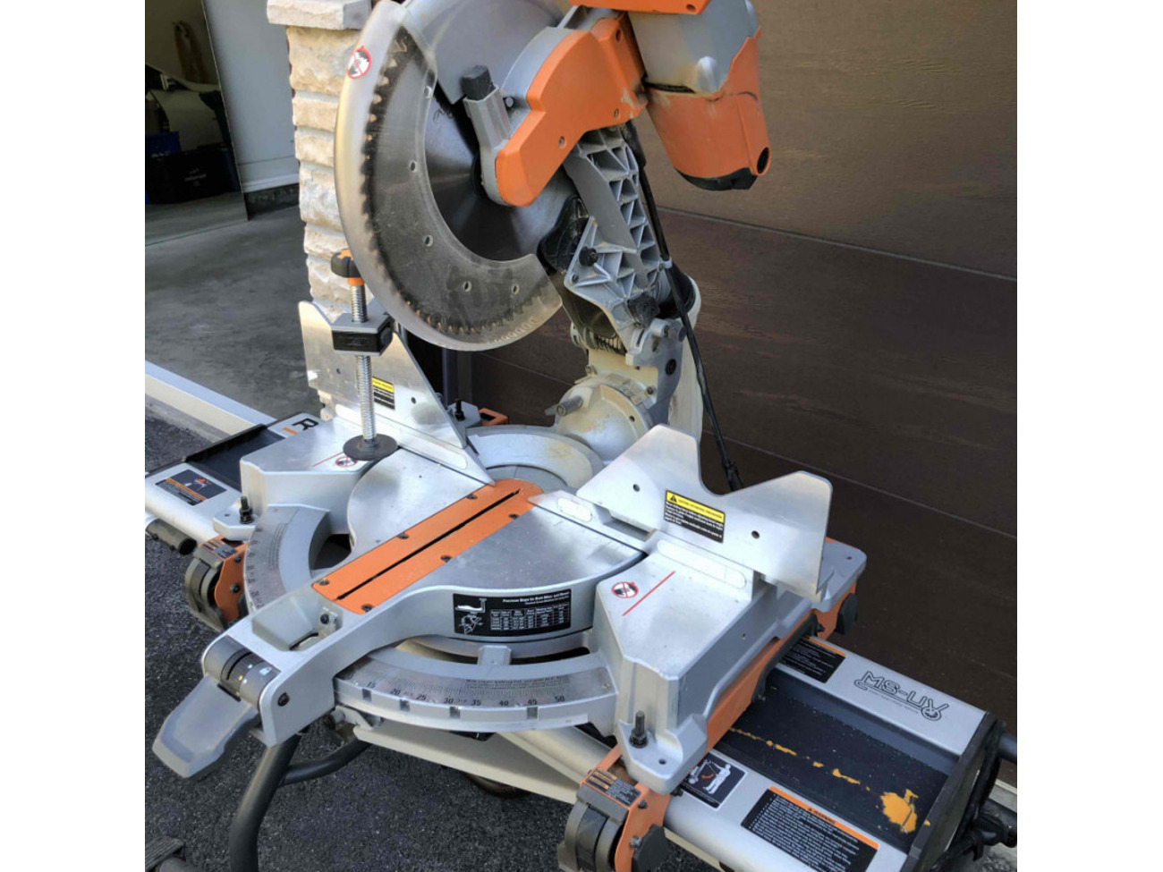 Rent Rigid 12 inch dual bevel mitre saw with collapsing stand from Rob ...